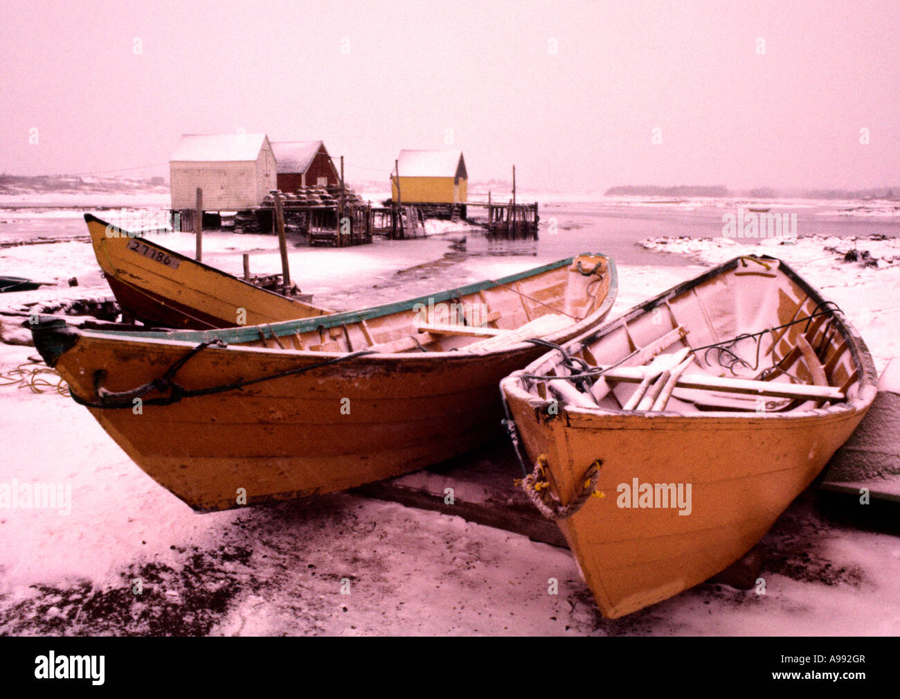 Village of Blue Rocks Nova Scotia in winter 1976 with snow and dory ...