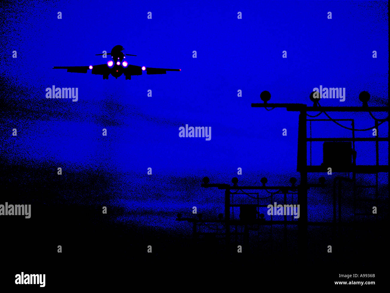 commercial jet landing at night Stock Photo - Alamy