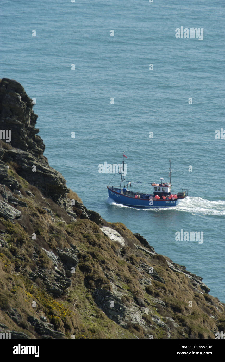 A small inshore fishing boat off Bolt Head on its way to Salcome ...