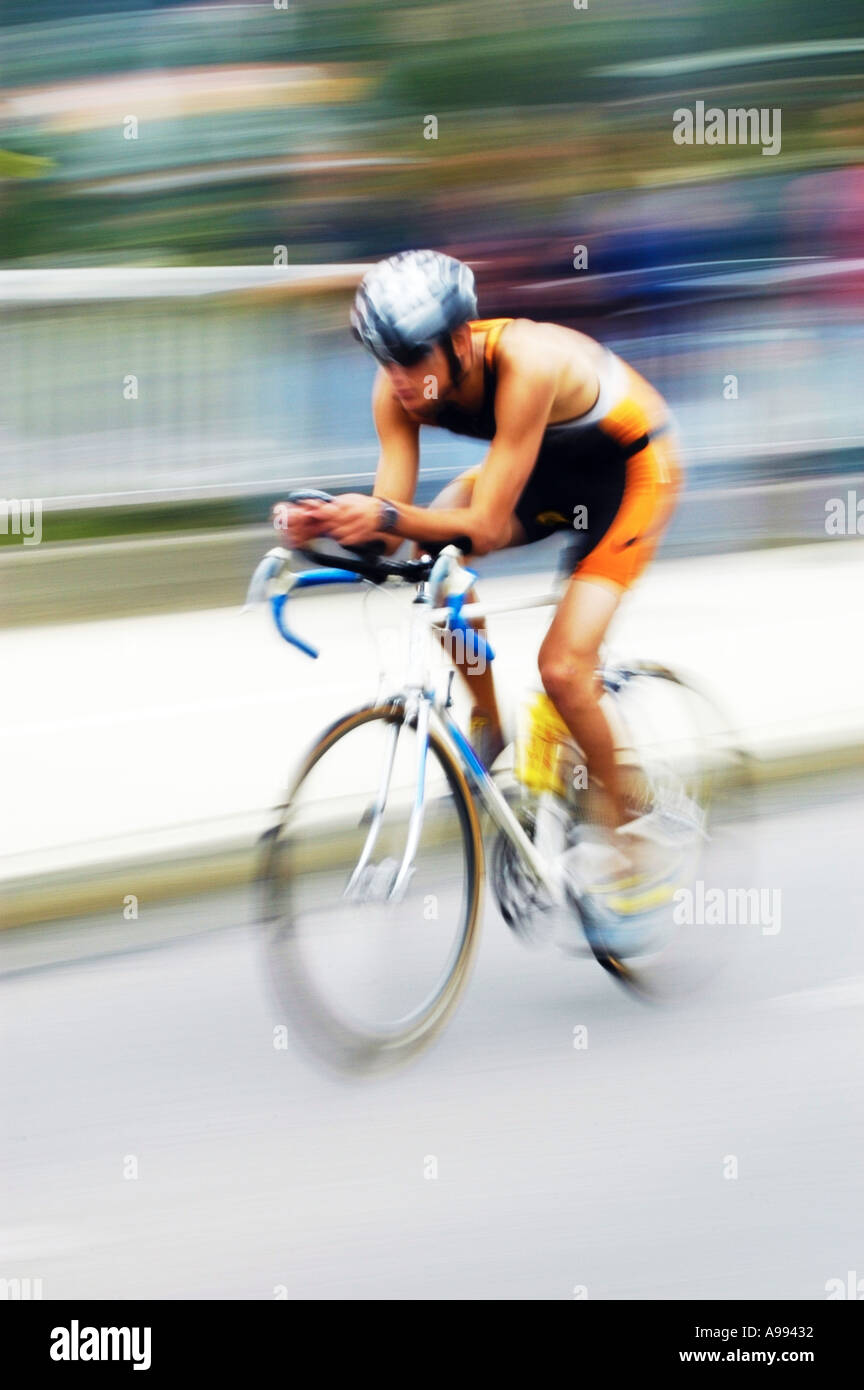 Racing cyclist in movement Stock Photo - Alamy