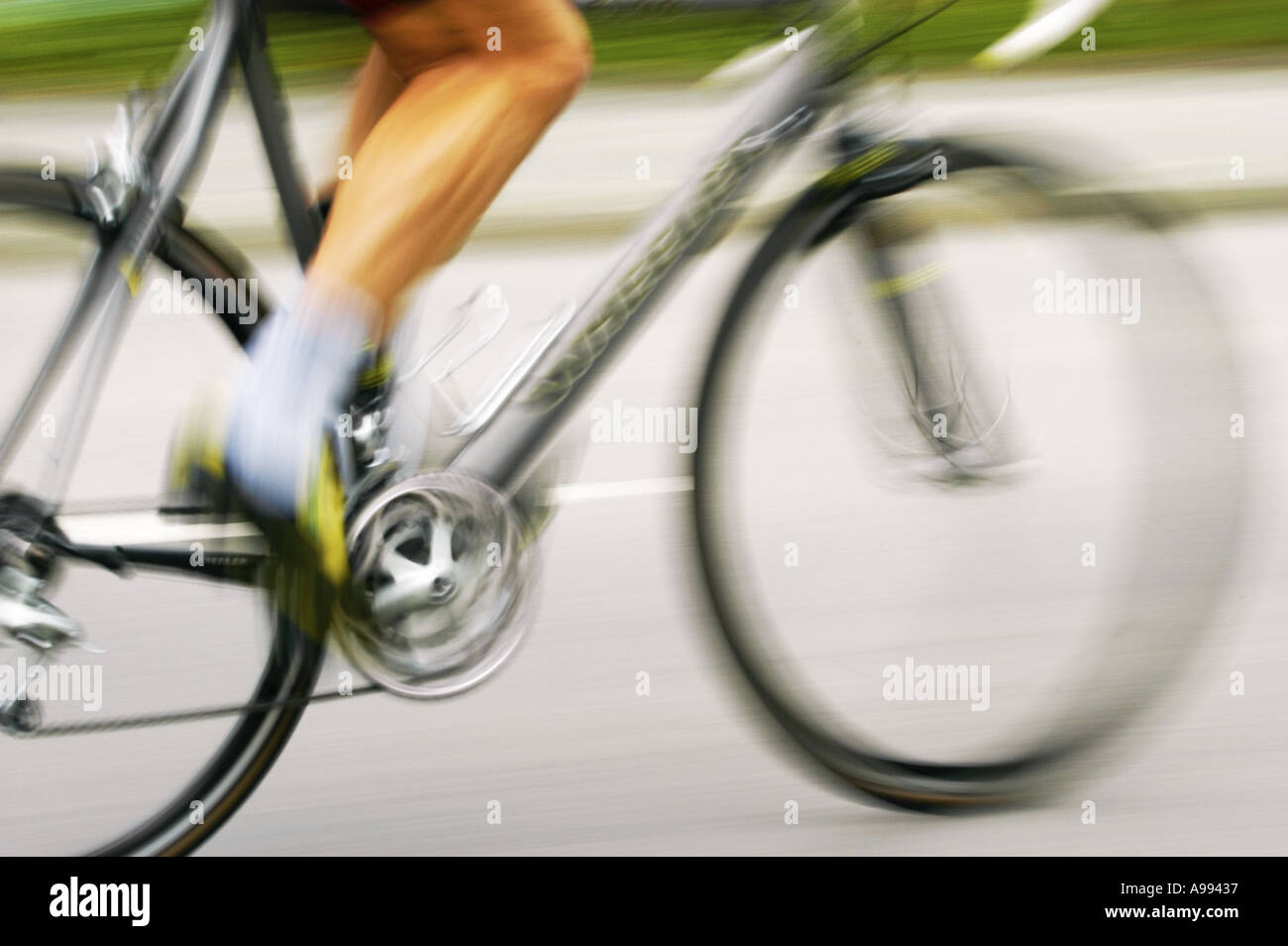 Racing cyclist in movement Stock Photo - Alamy