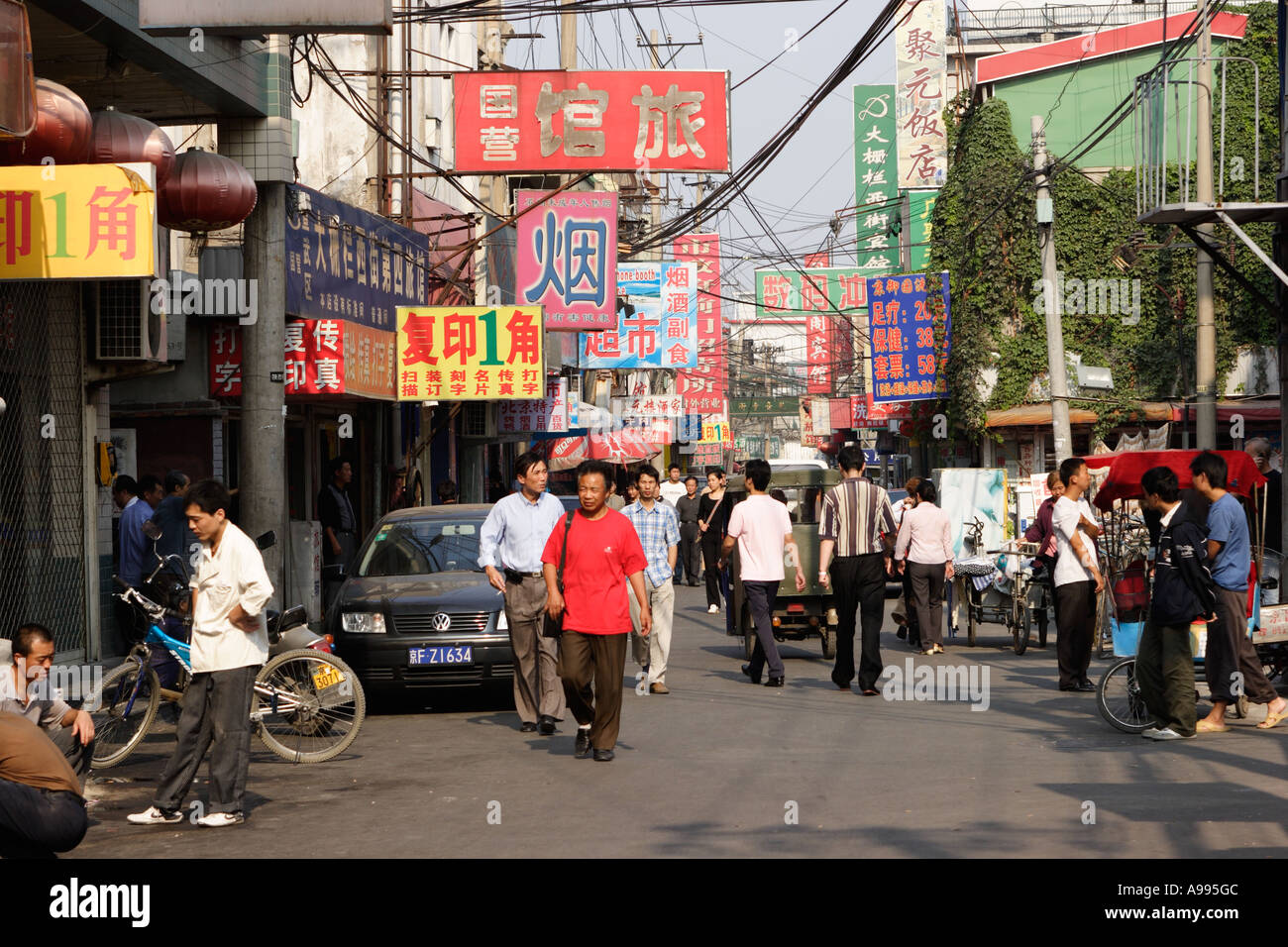 Hutong Lane lined with shops Hutongs are traditonal courtyard homes ...