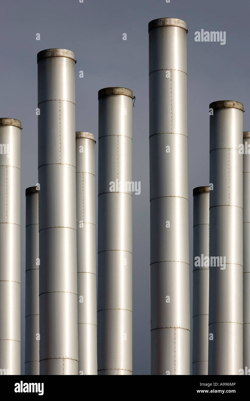 Digital composite of metal chimneys Stock Photo - Alamy