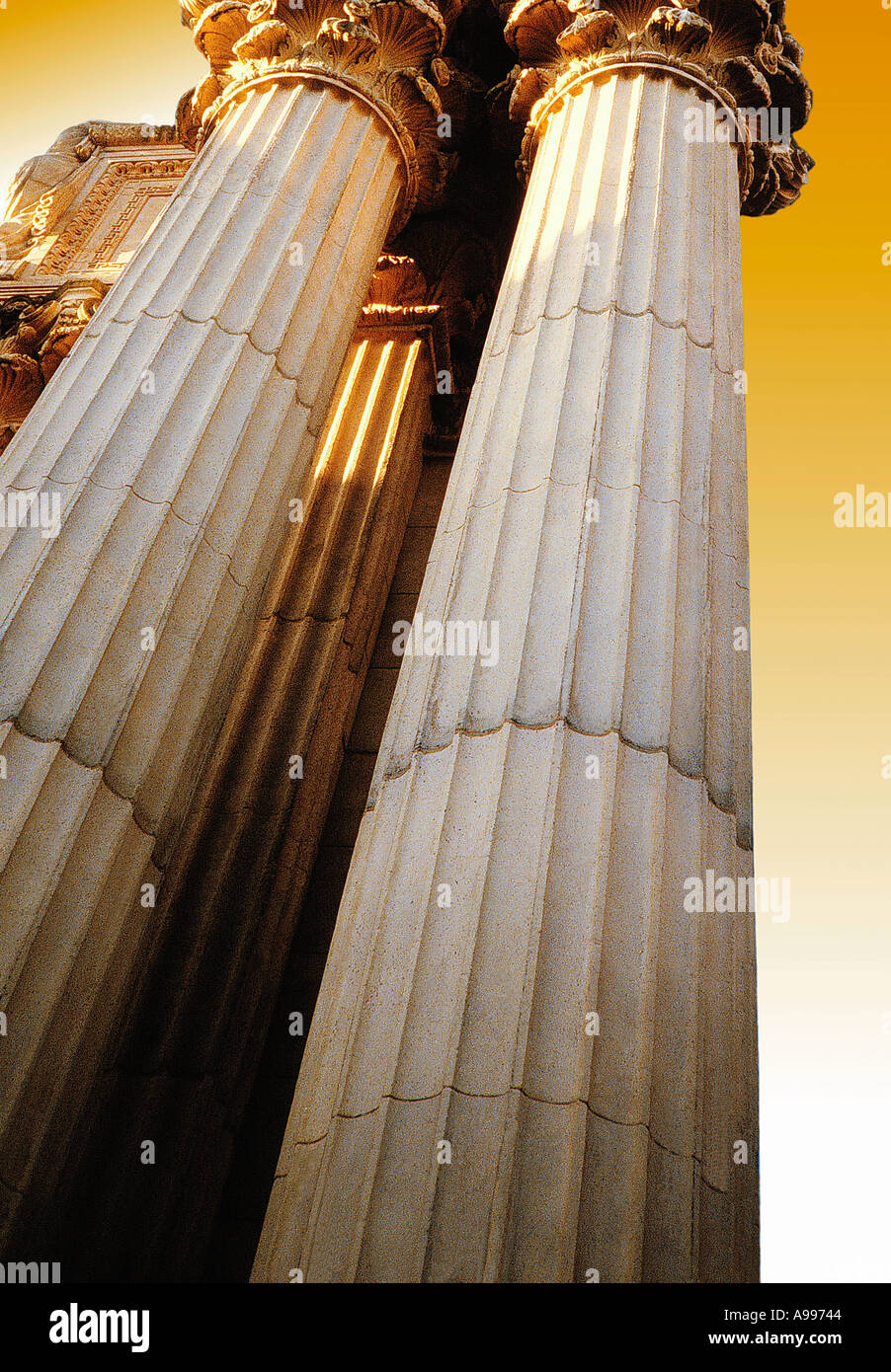 View looking up at two very large white columns Stock Photo - Alamy