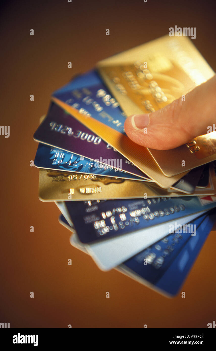 hand holding bank credit cards Stock Photo - Alamy