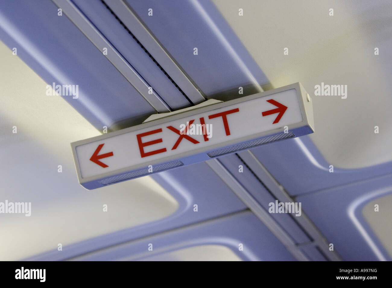 Exit sign on airplane Boeing 737 interior Stock Photo - Alamy