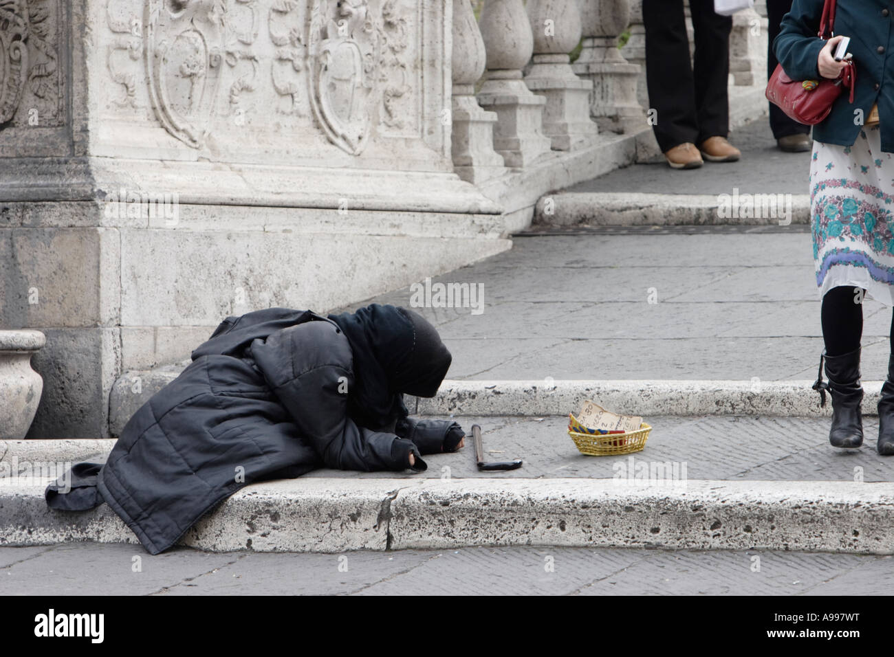 Beggar on the steps to the Palazzo dei Conservatori on Capitol hill in ...