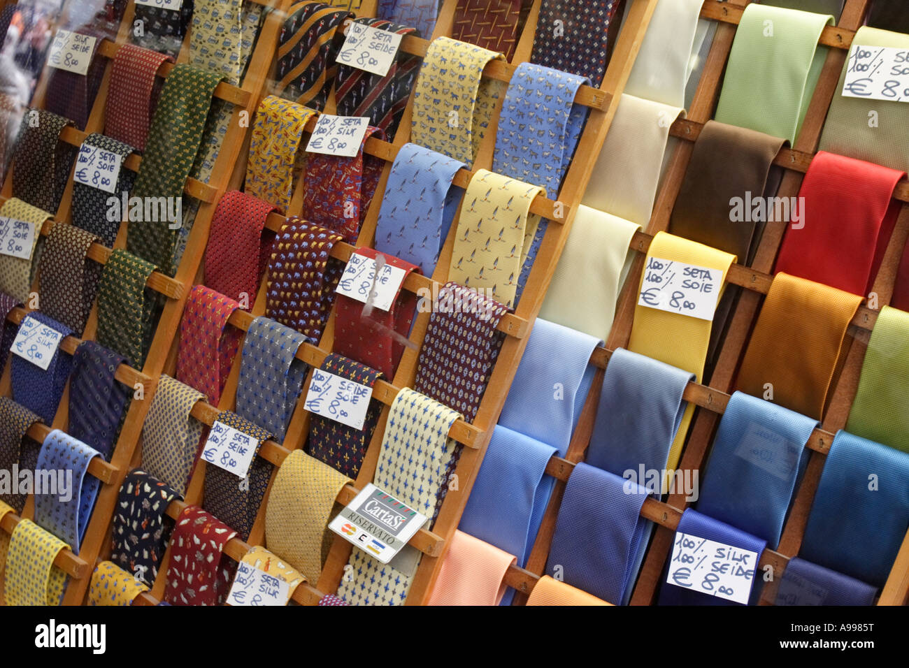 Colored necktie hang in a shop in Rome, Italy Stock Photo - Alamy