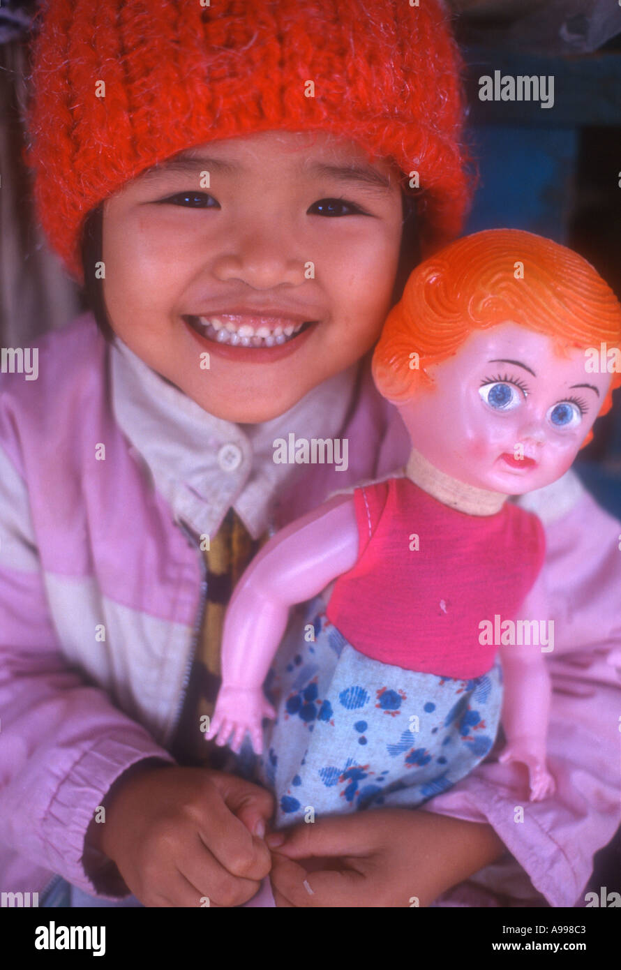 Girl with Doll Stock Photo - Alamy