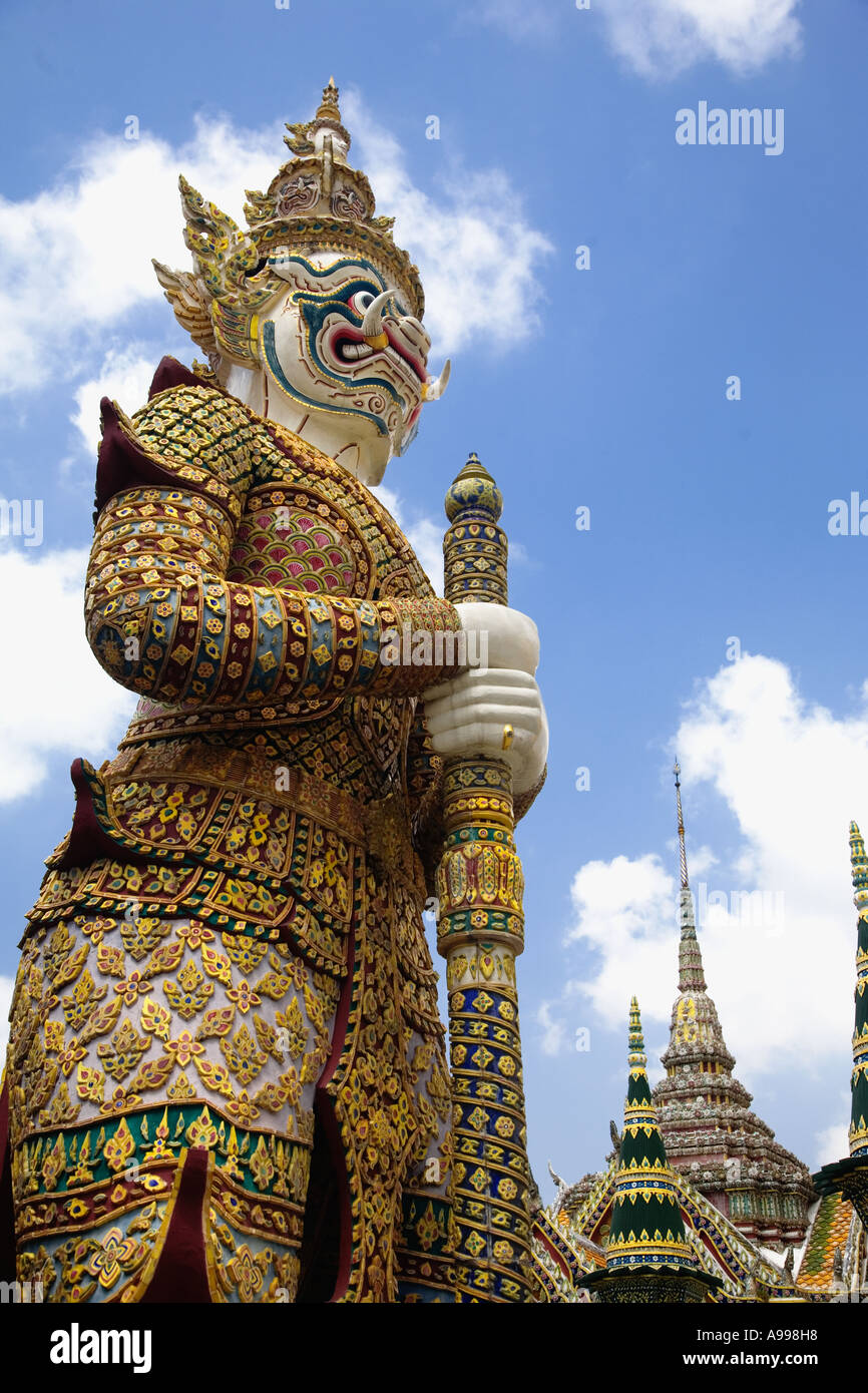 Temple or gate guard one of six pairs of demon guardian statues facing ...