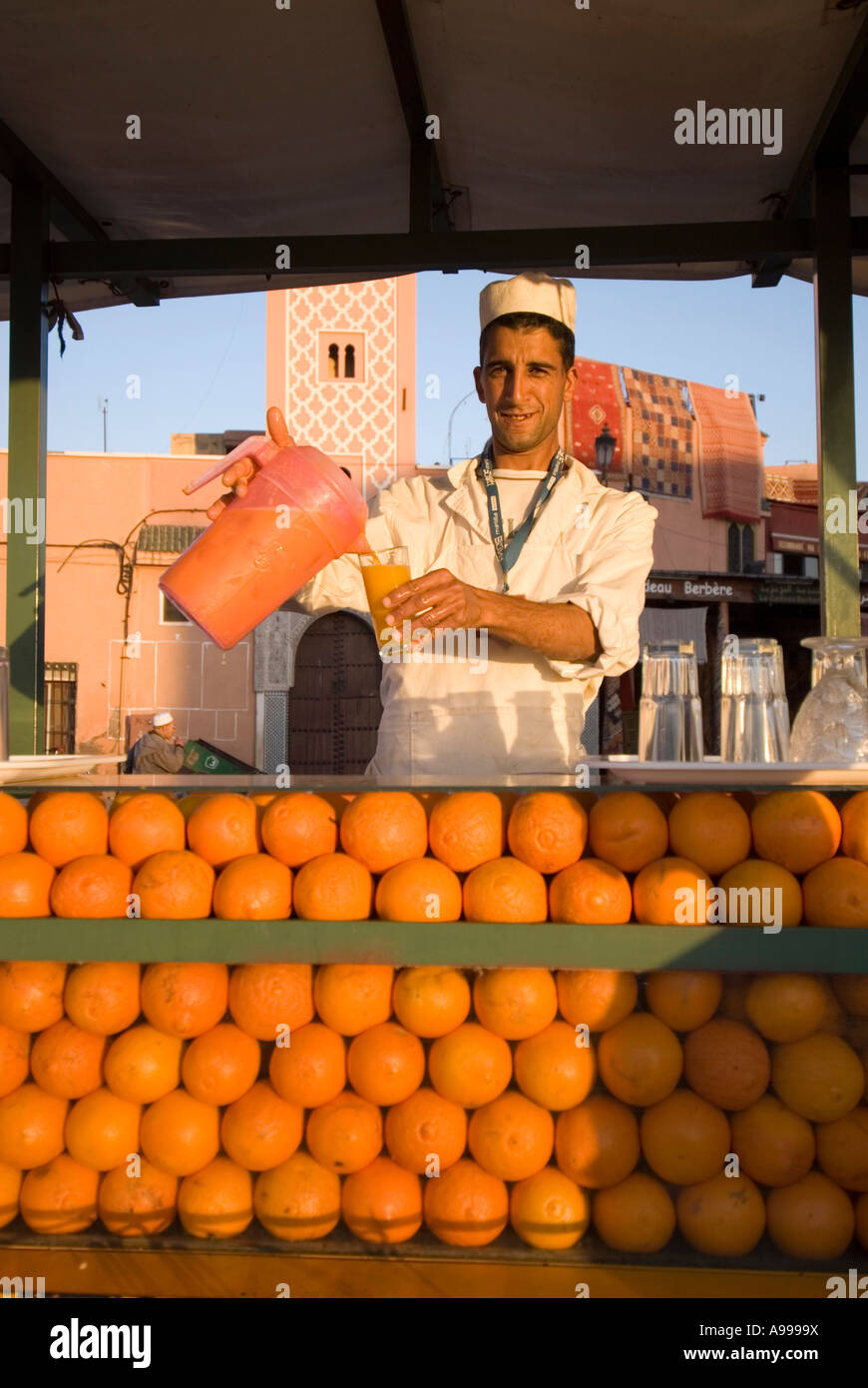 Stall selling freshly pressed orange juice on the central square of ...