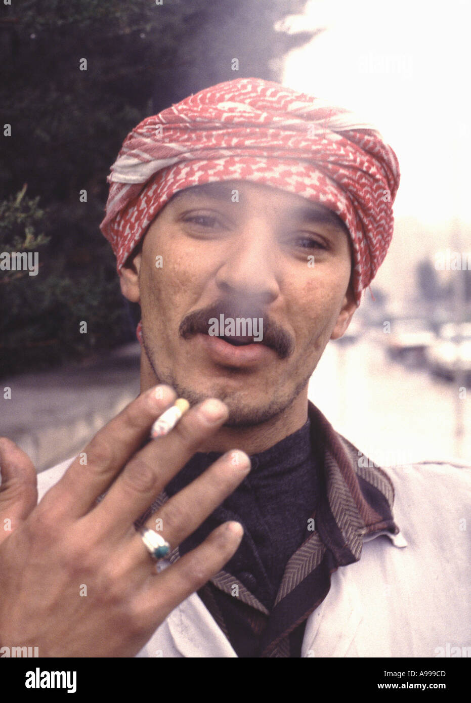 young smoker Iraq Stock Photo - Alamy