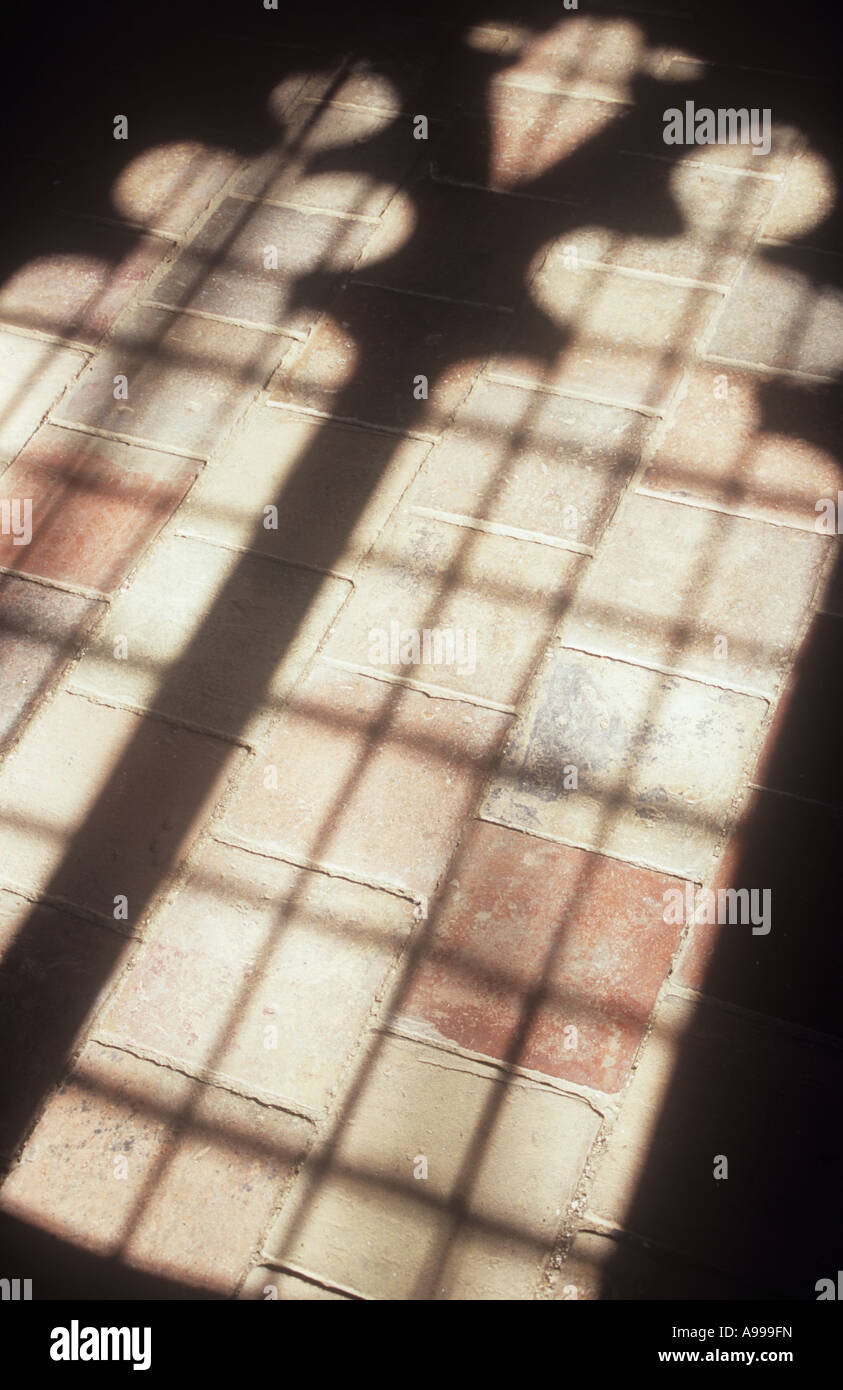 Clear small square leaded window in English Gothic style projected onto ...