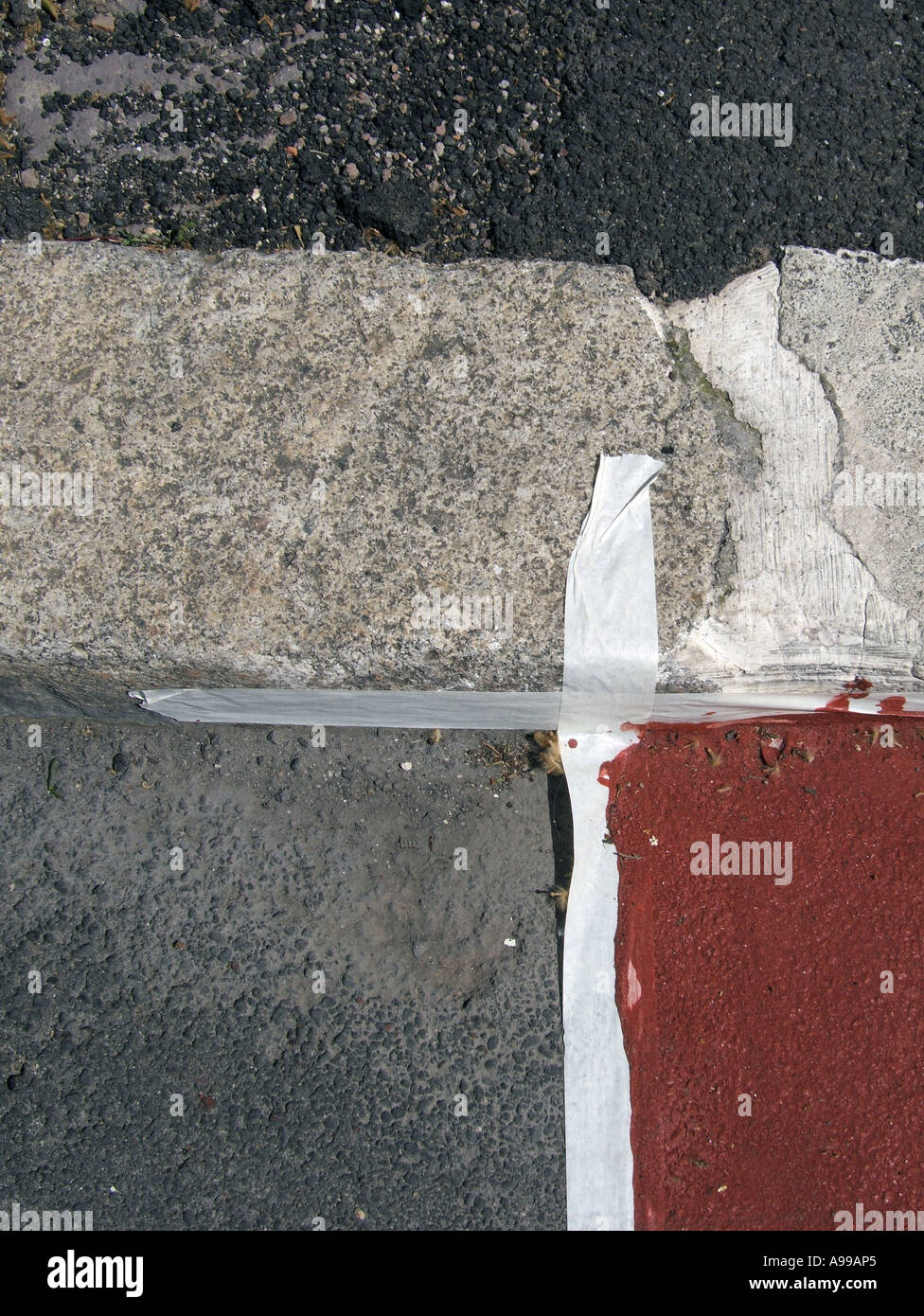 brown red paint on road - cycle path construction Stock Photo - Alamy