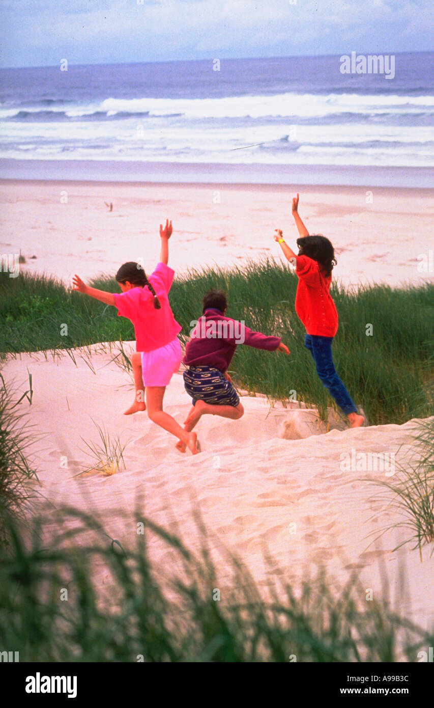 Kids on beach Stock Photo - Alamy
