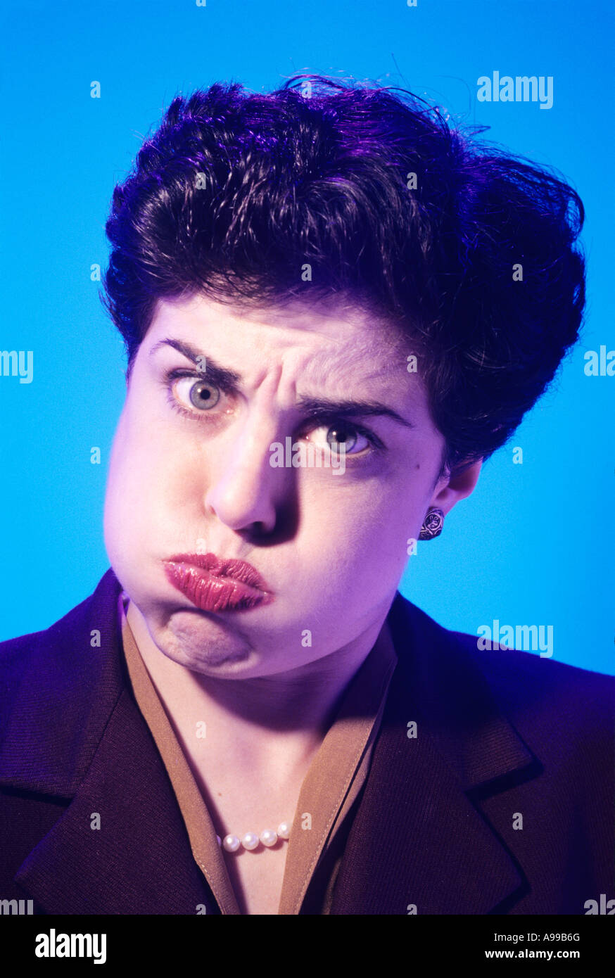 97-132A-WOMAN HOLDING BREATH, 'BLUE IN THE FACE' Stock Photo - Alamy