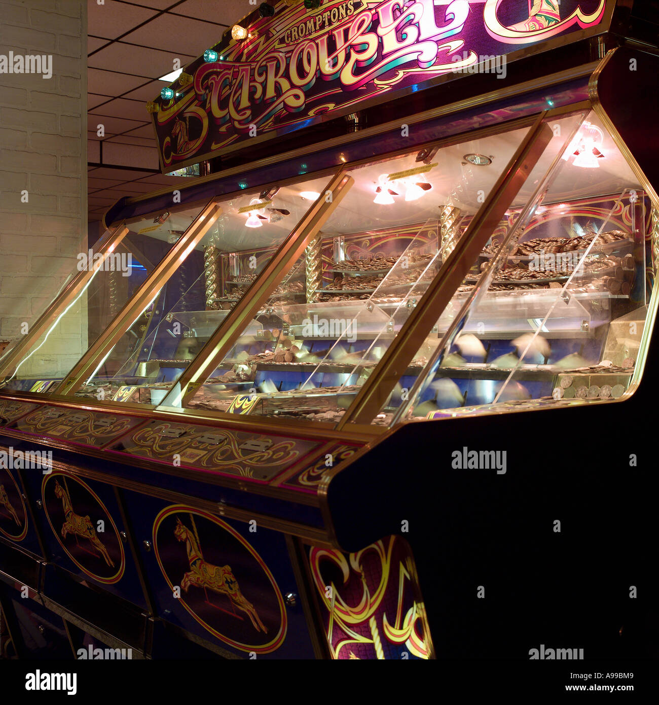 Coin pusher hi-res stock photography and images - Alamy