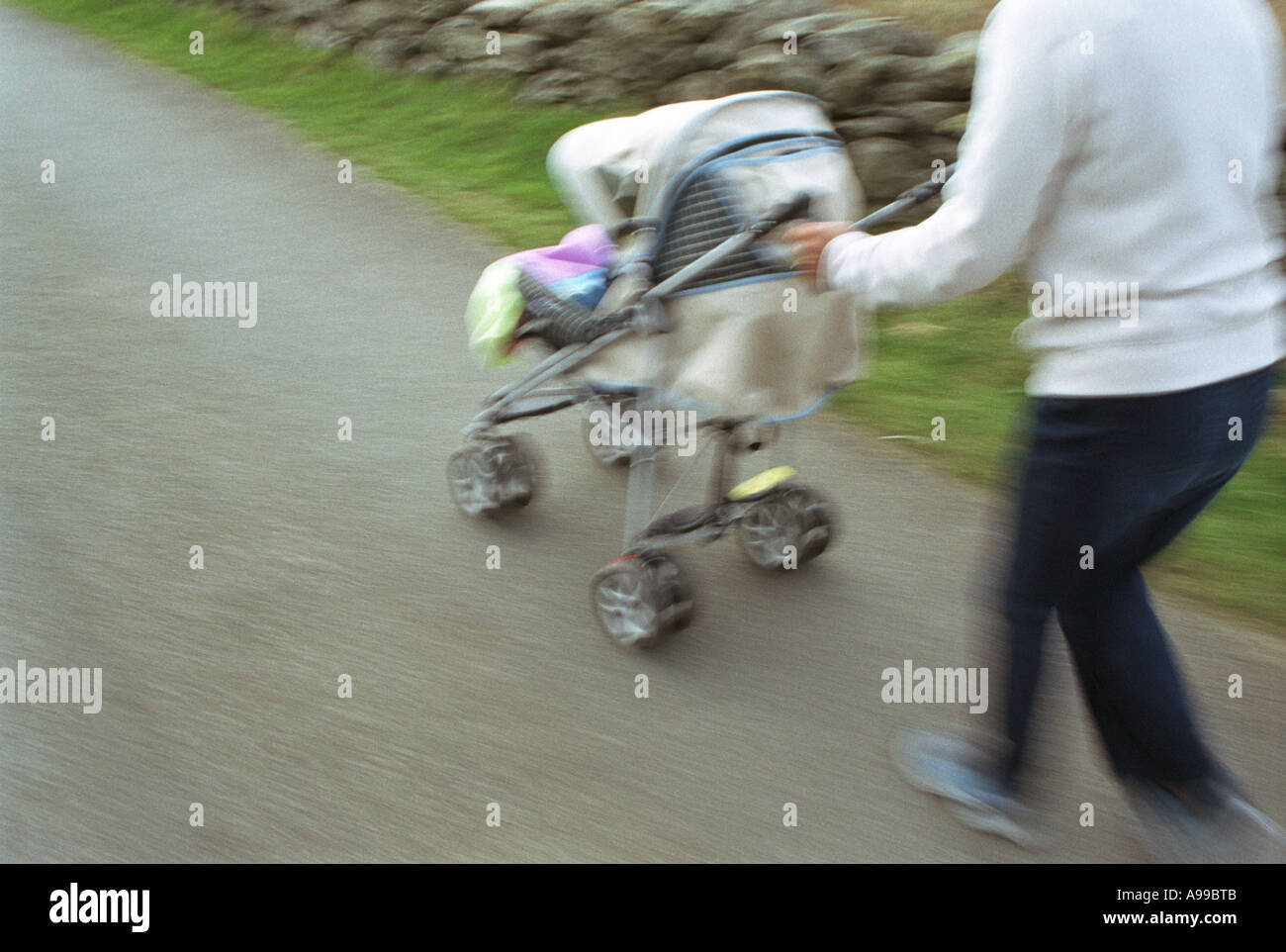 Woman mum pushing walking hi-res stock photography and images - Alamy