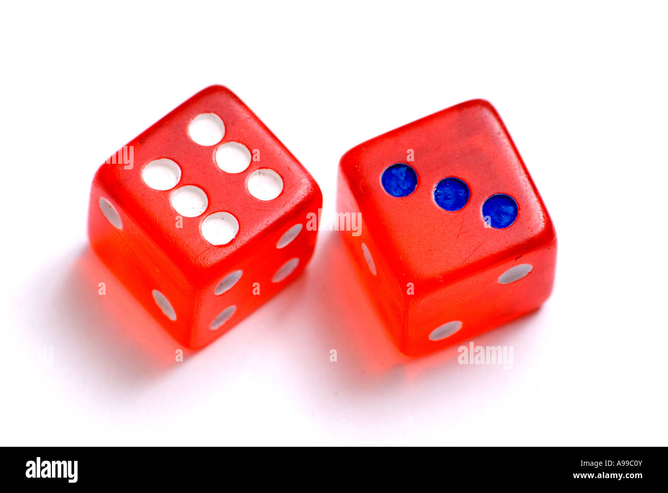 A pair of red dice showing a total of nine Stock Photo - Alamy
