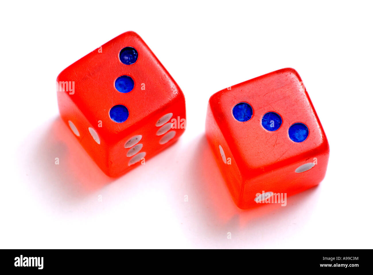 A red pair of dice on a white background Stock Photo - Alamy