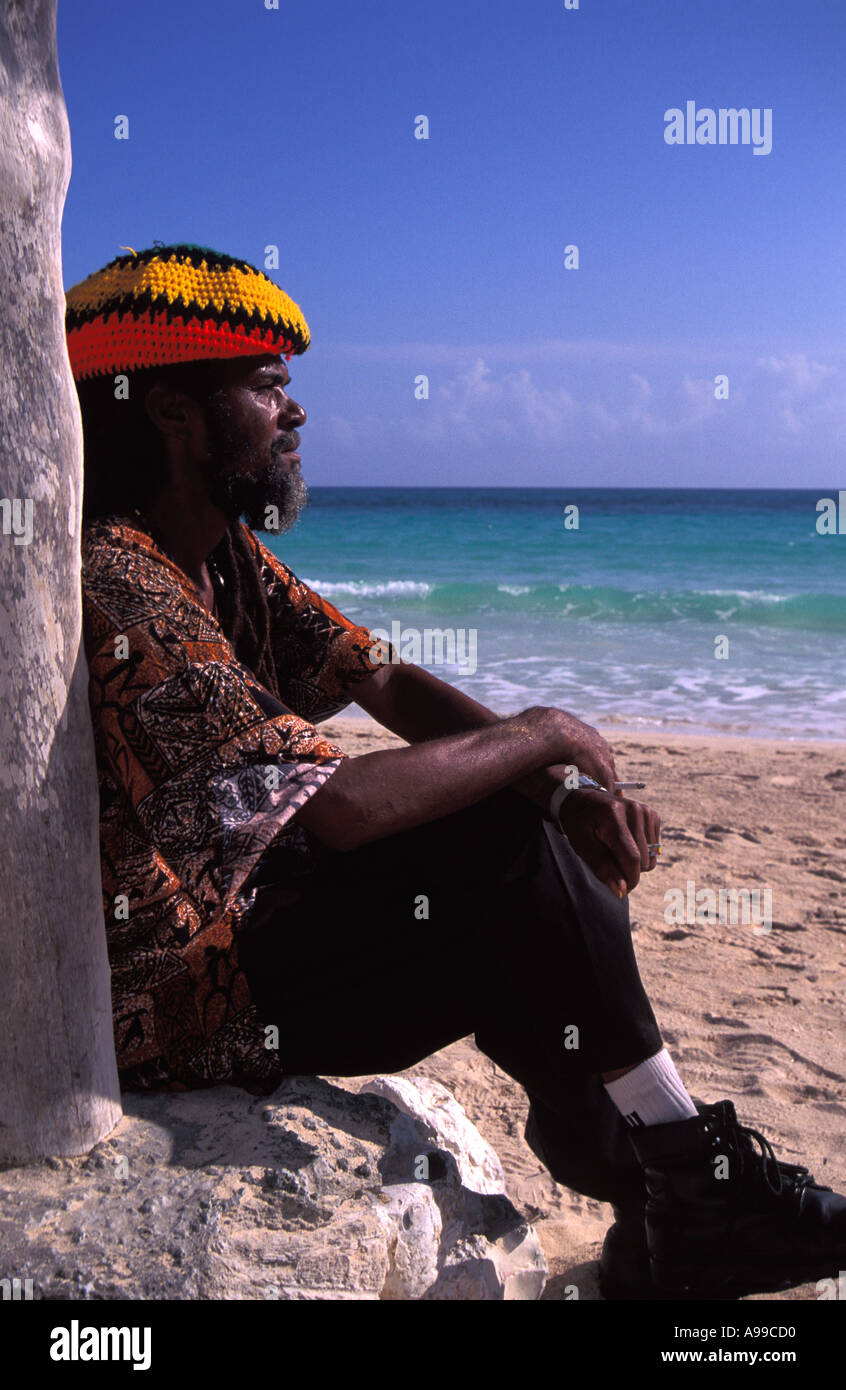 Local Jamaican Man Relaxes on The Beach Stock Photo - Alamy
