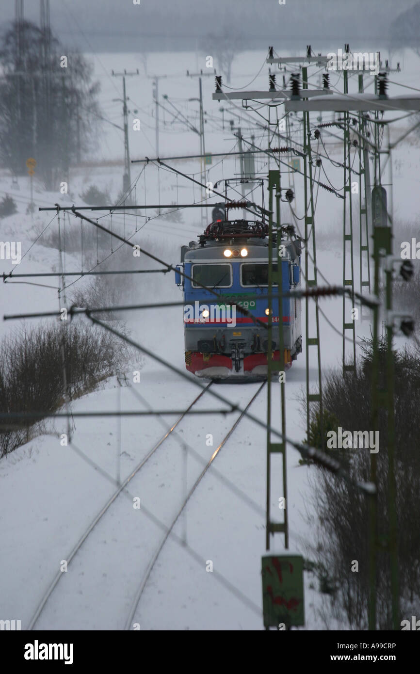 Train in snow in Sweden Stock Photo - Alamy