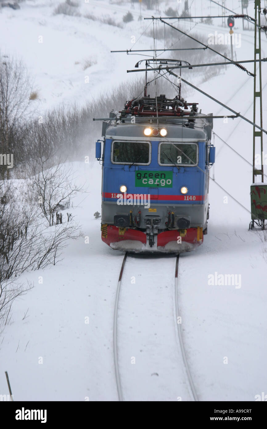 Train in snow in Sweden Stock Photo - Alamy