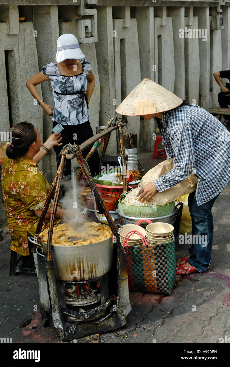 Selling food on the street, hawkers in Ho Chi Minh City, Vietnam Stock ...