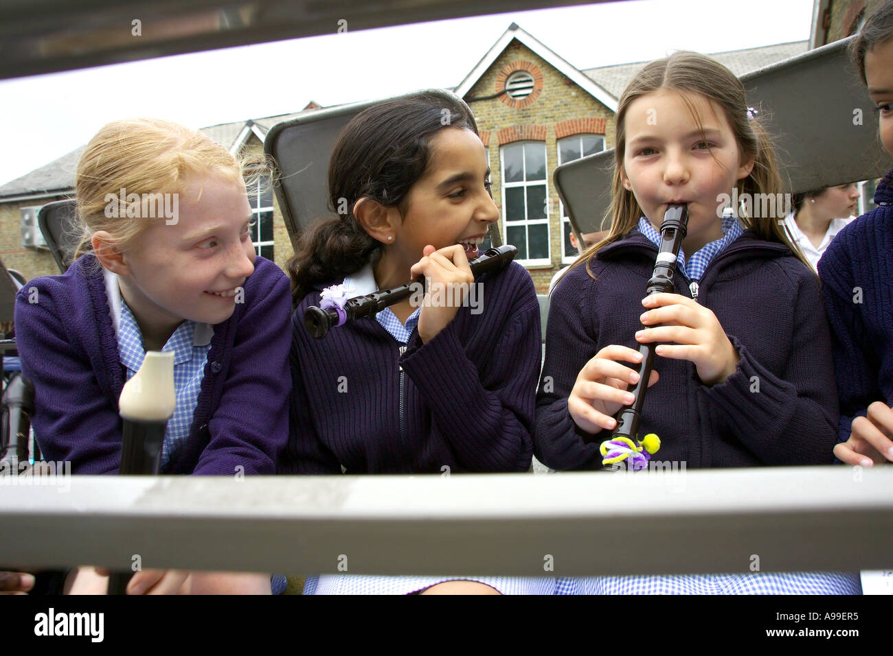 Children playing recorders hi-res stock photography and images - Alamy