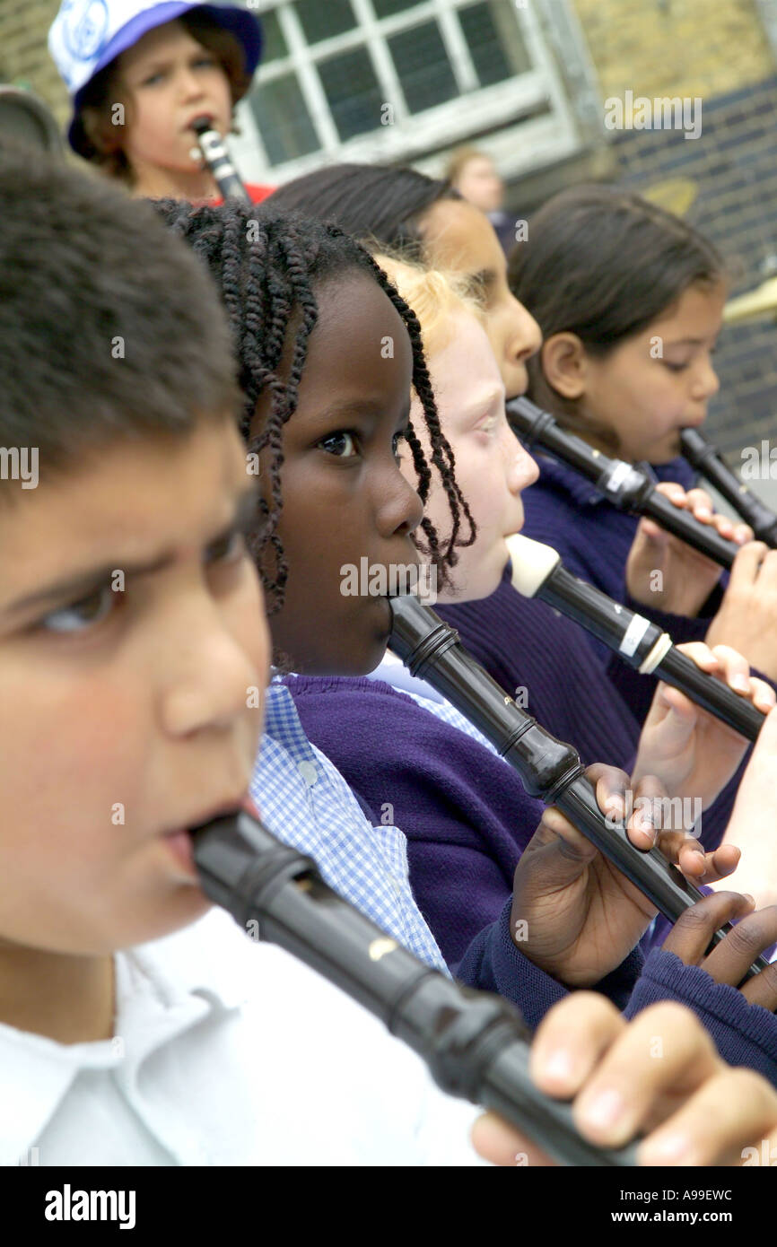 Kids playing instruments orchestra hi-res stock photography and images ...