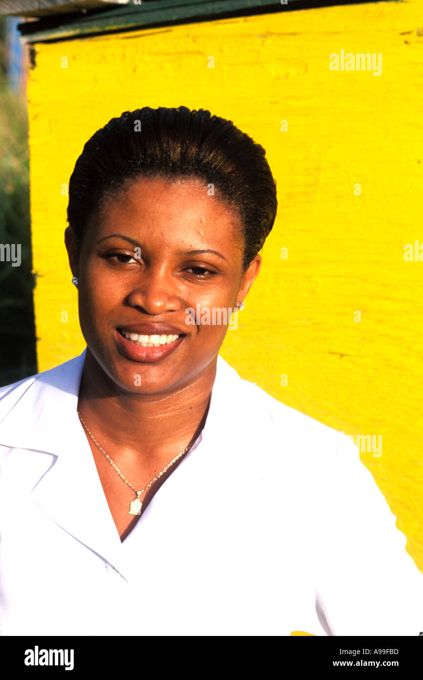 Colorful portrait of young local woman in St Vincent and the Grenadines ...