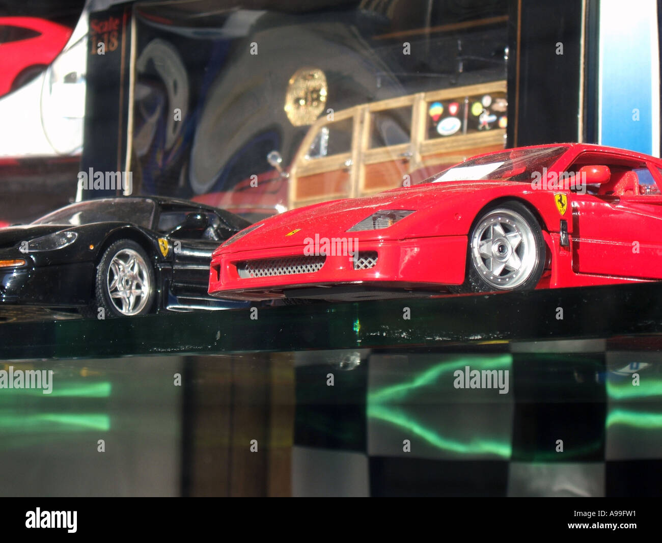 red ferrari miniature toy car in shop window Stock Photo - Alamy