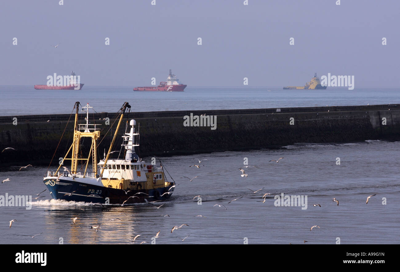 Peterhead fishing boat 'Calisha' enters the harbour at Aberdeen ...