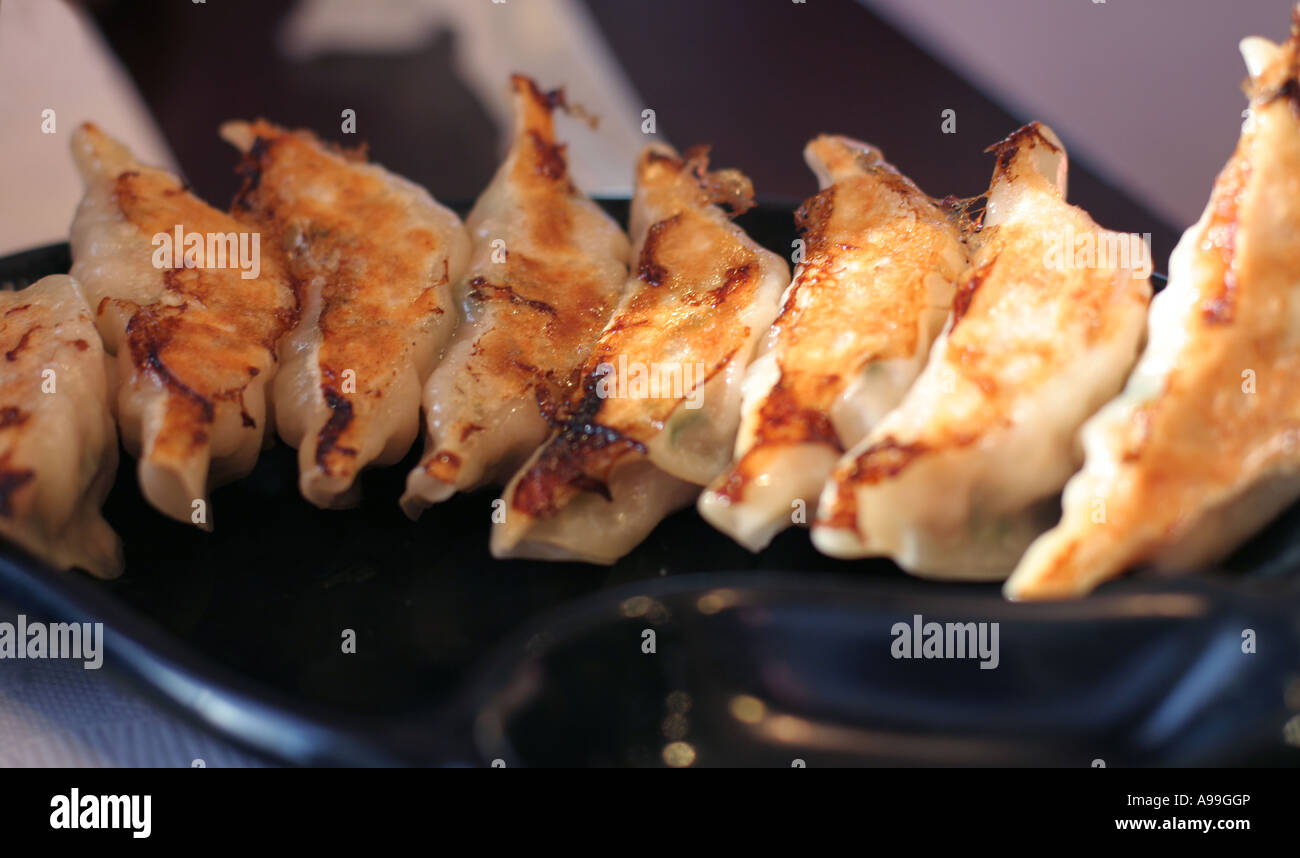 Pot Stickers wontons gyoza on plate Stock Photo - Alamy