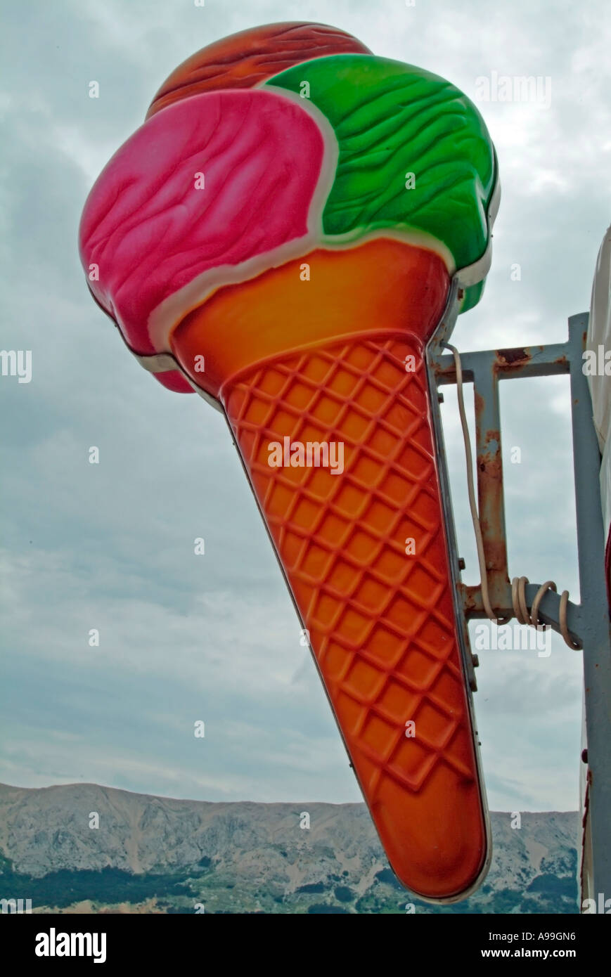 ice cream cone sign advertising for a ice cream parlor Stock Photo - Alamy