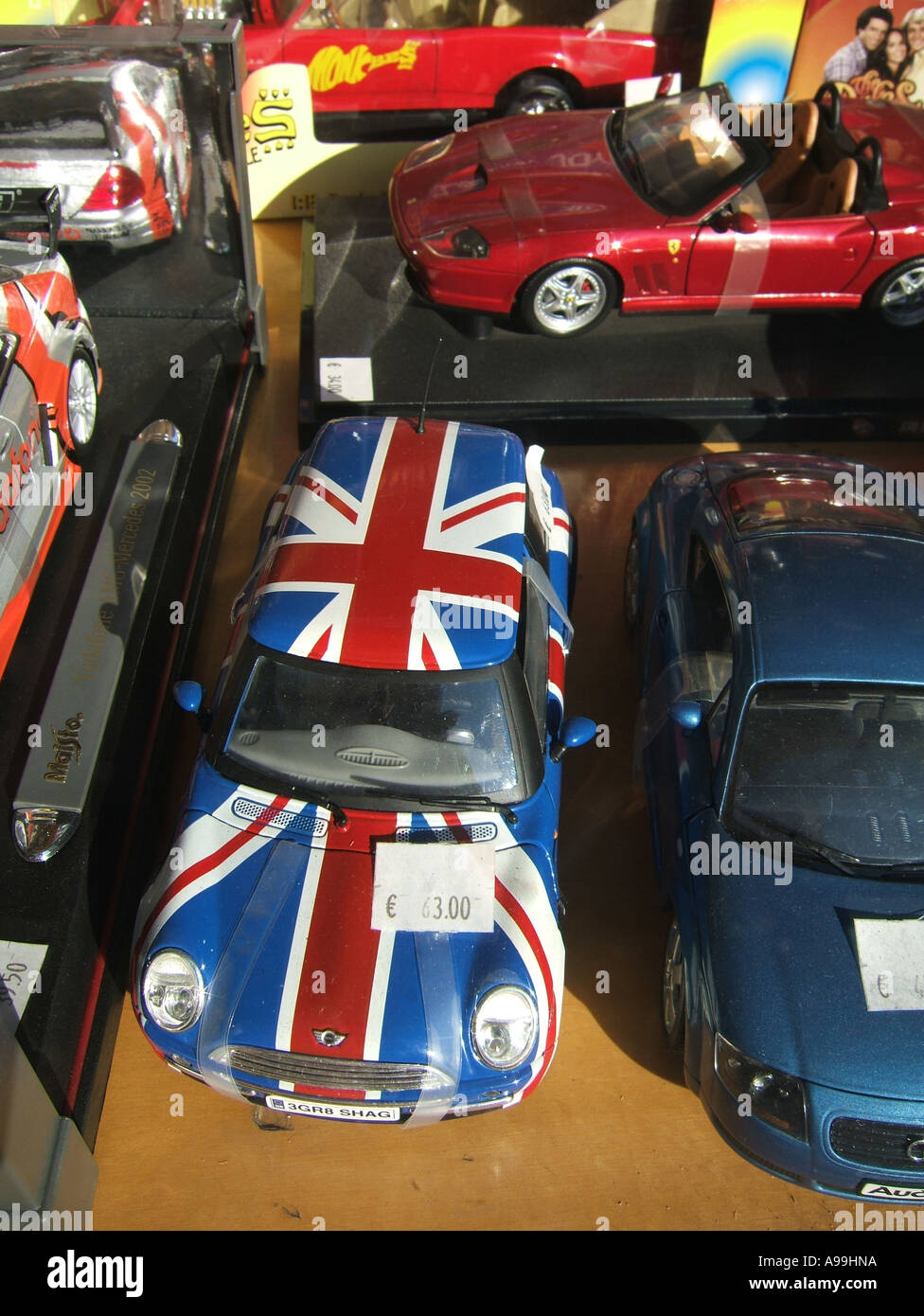 miniature car toys in shop window Stock Photo - Alamy