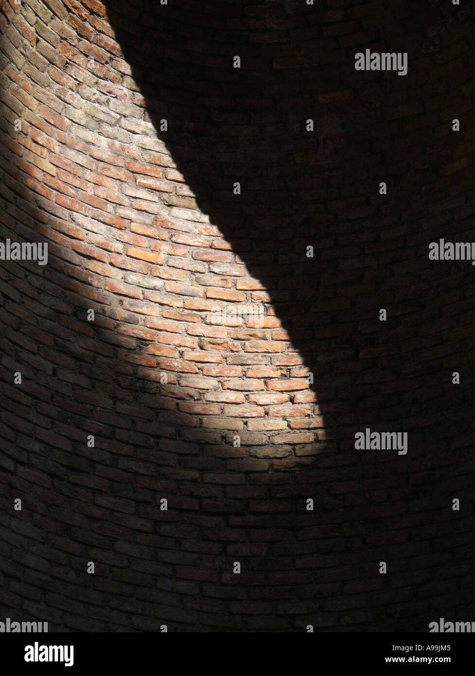 brick wall and sun breaking through Stock Photo - Alamy