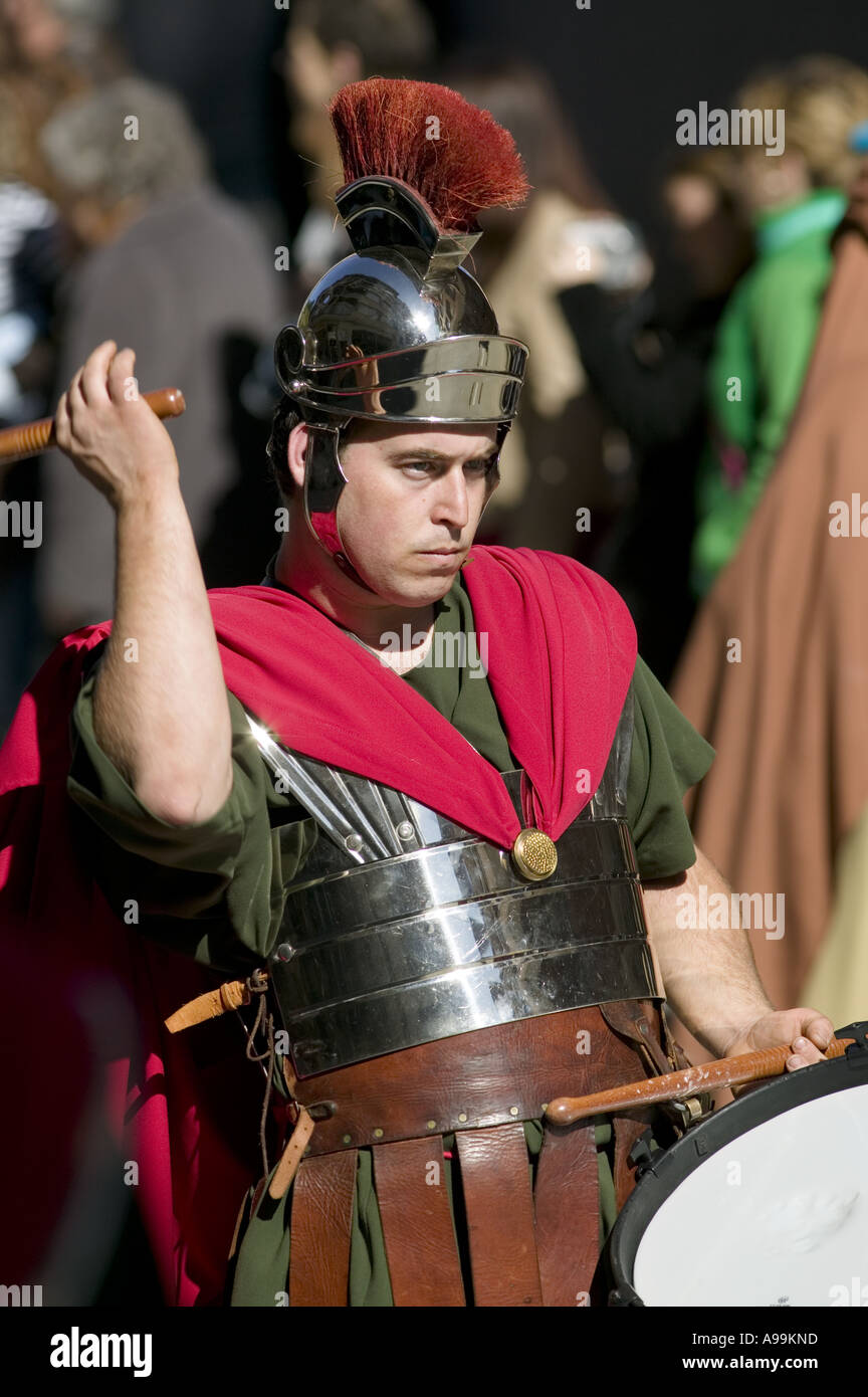 Man wearing Roman soldiers uniform beating drum during Holy Week ...