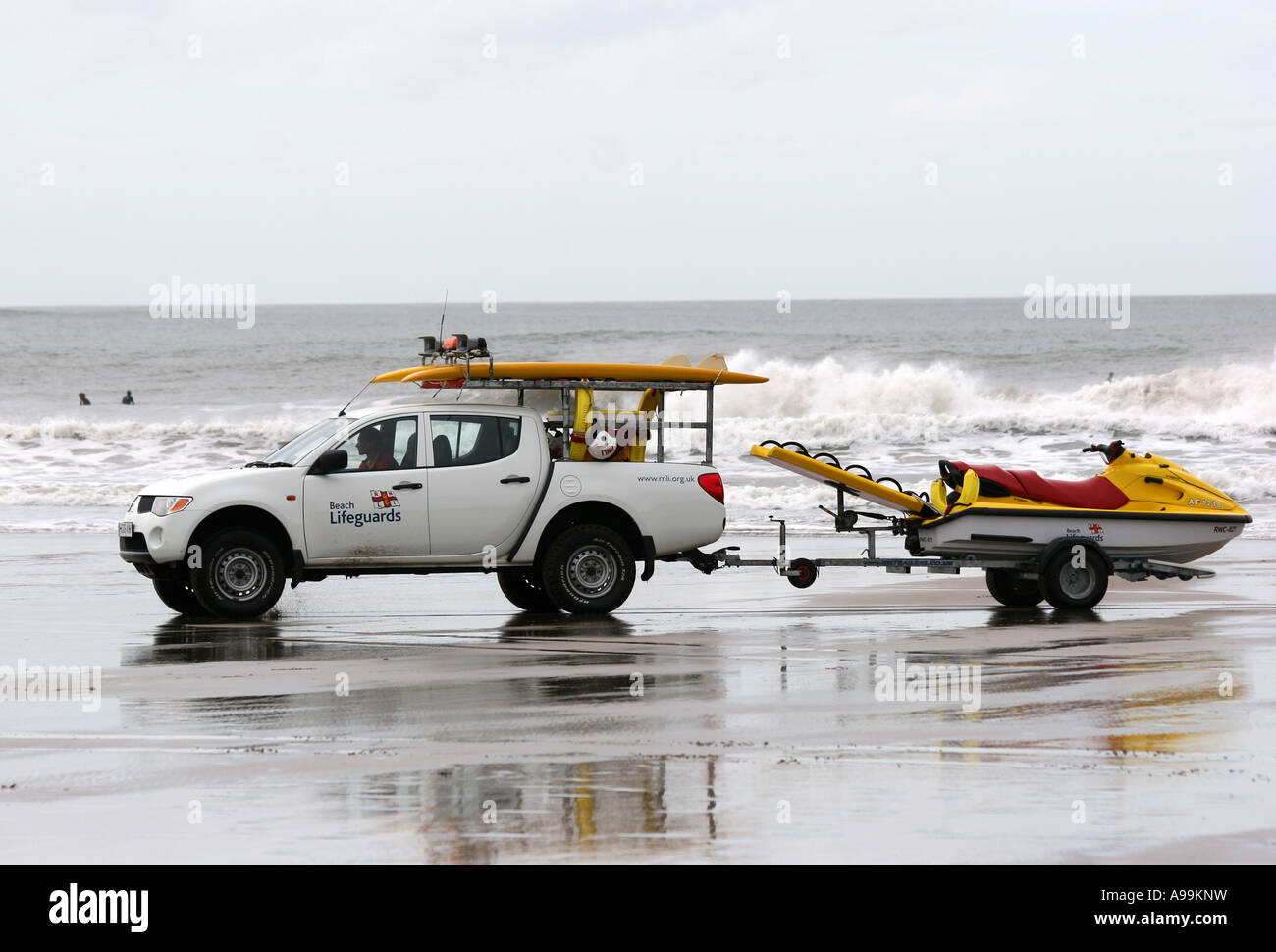 Croyde Town Beach RNLI lifeguards truck and jetski Stock Photo - Alamy