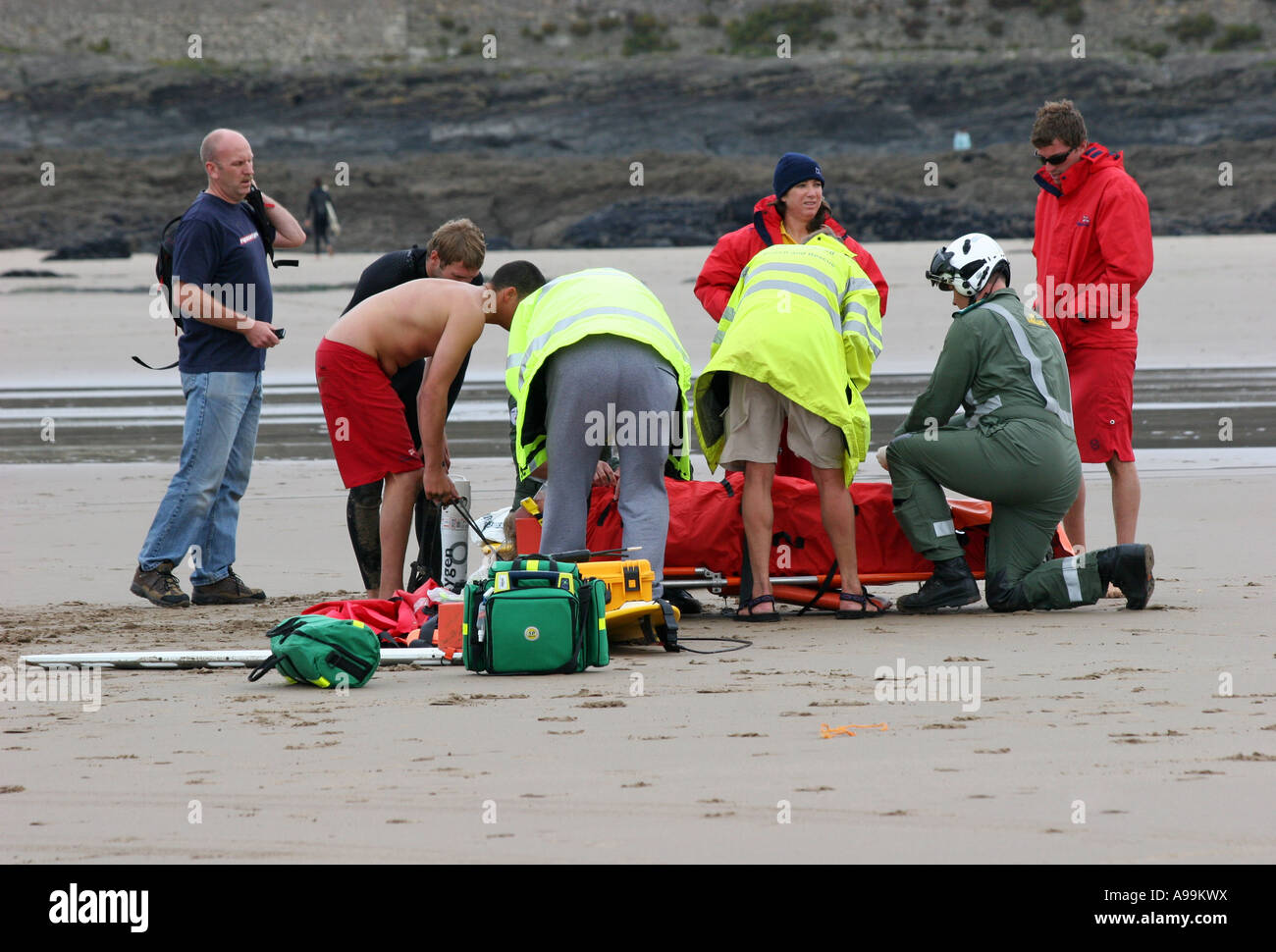 Ambulance crew working on a patient Stock Photo - Alamy