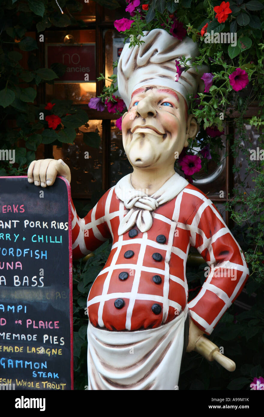 Chef advertising the day’s menu Stock Photo - Alamy
