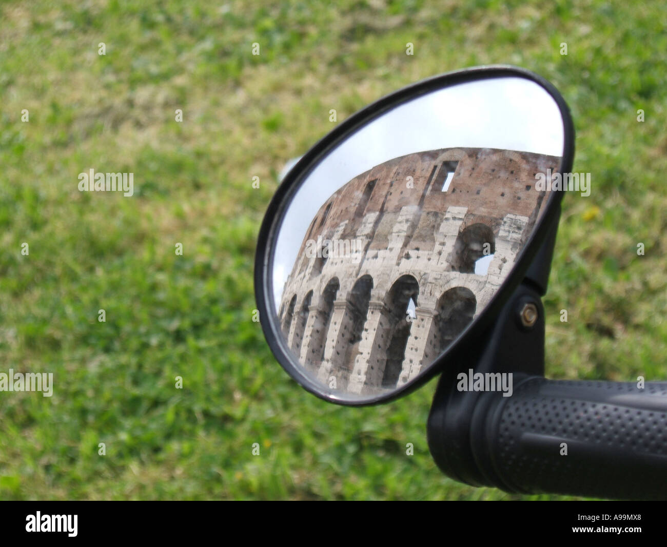 colosseum in rome seen in bike mirror Stock Photo - Alamy