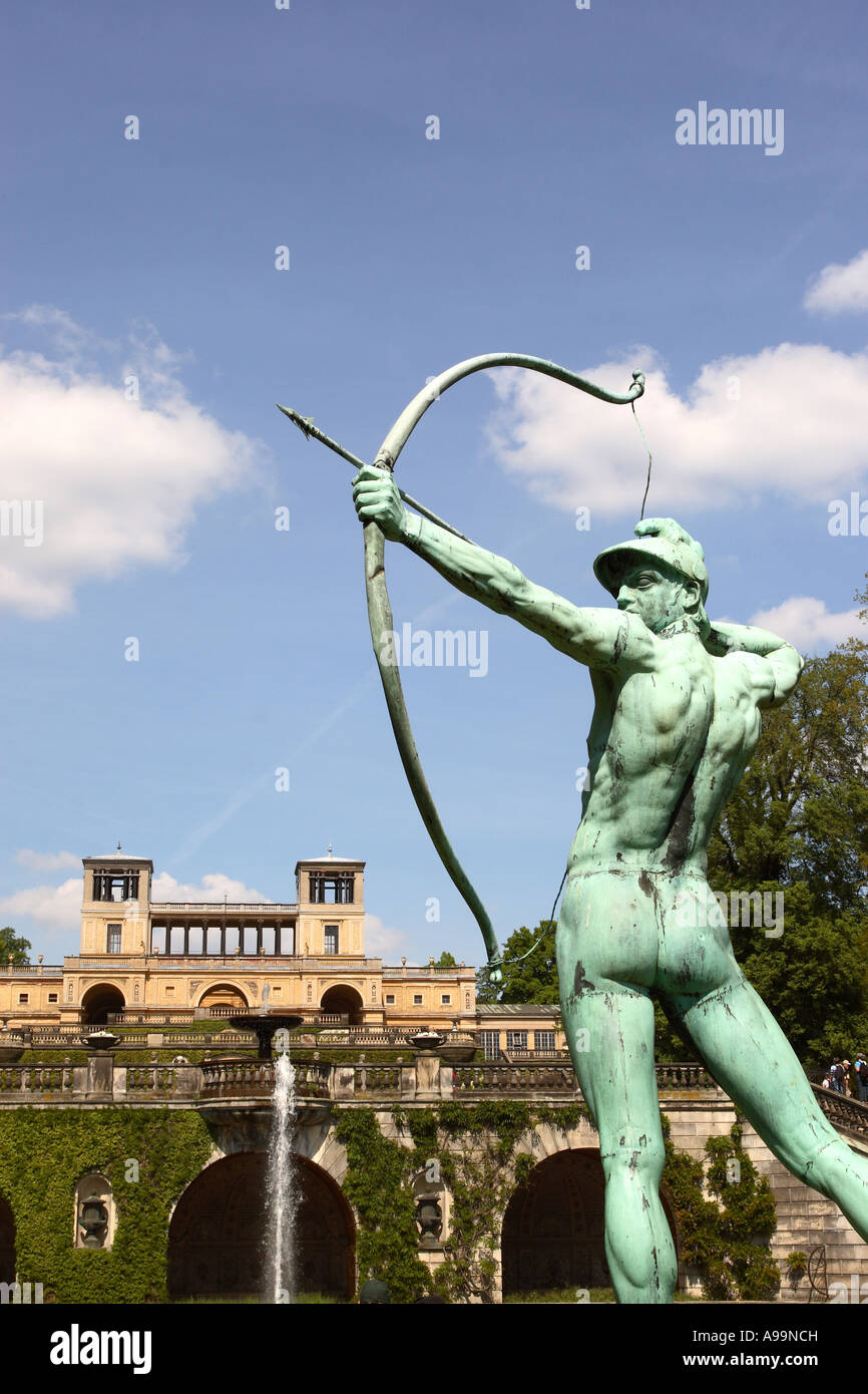 The statue of an archer in front of the Orangery in the grounds of ...