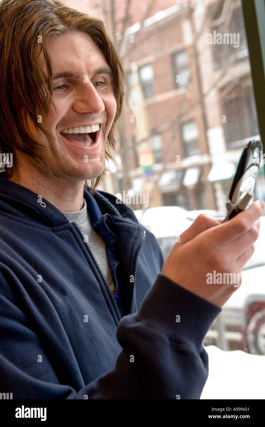 Male executive checking messages hi-res stock photography and images ...