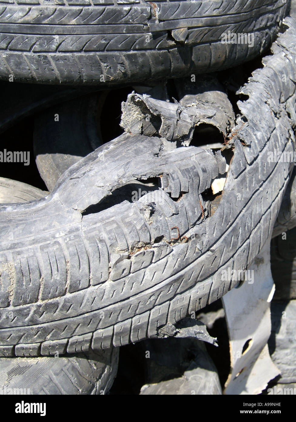 pile of crash damaged car tyres Stock Photo - Alamy