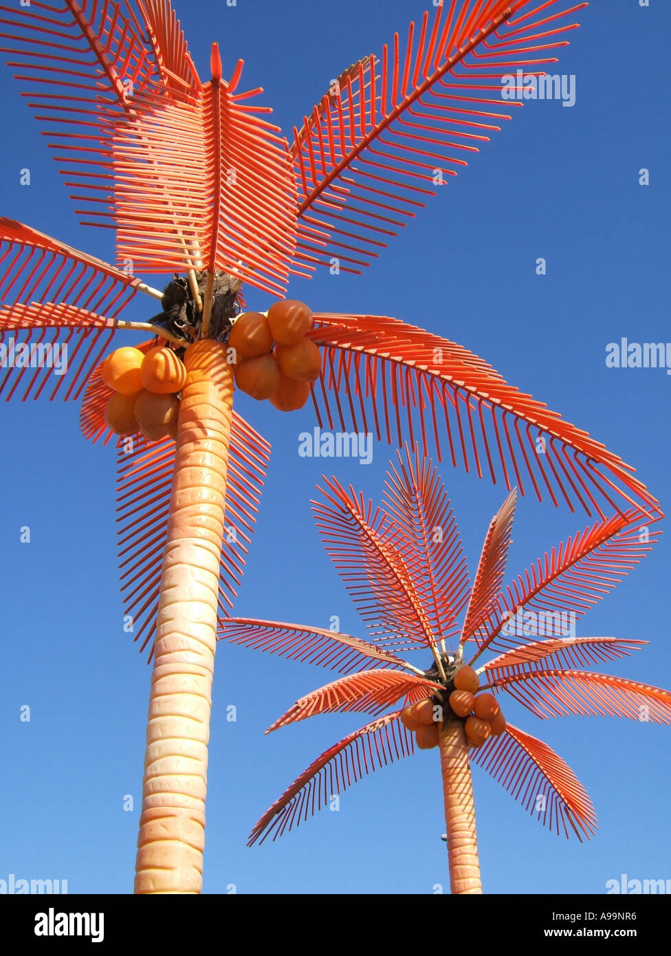 orange plastic palm trees Stock Photo - Alamy