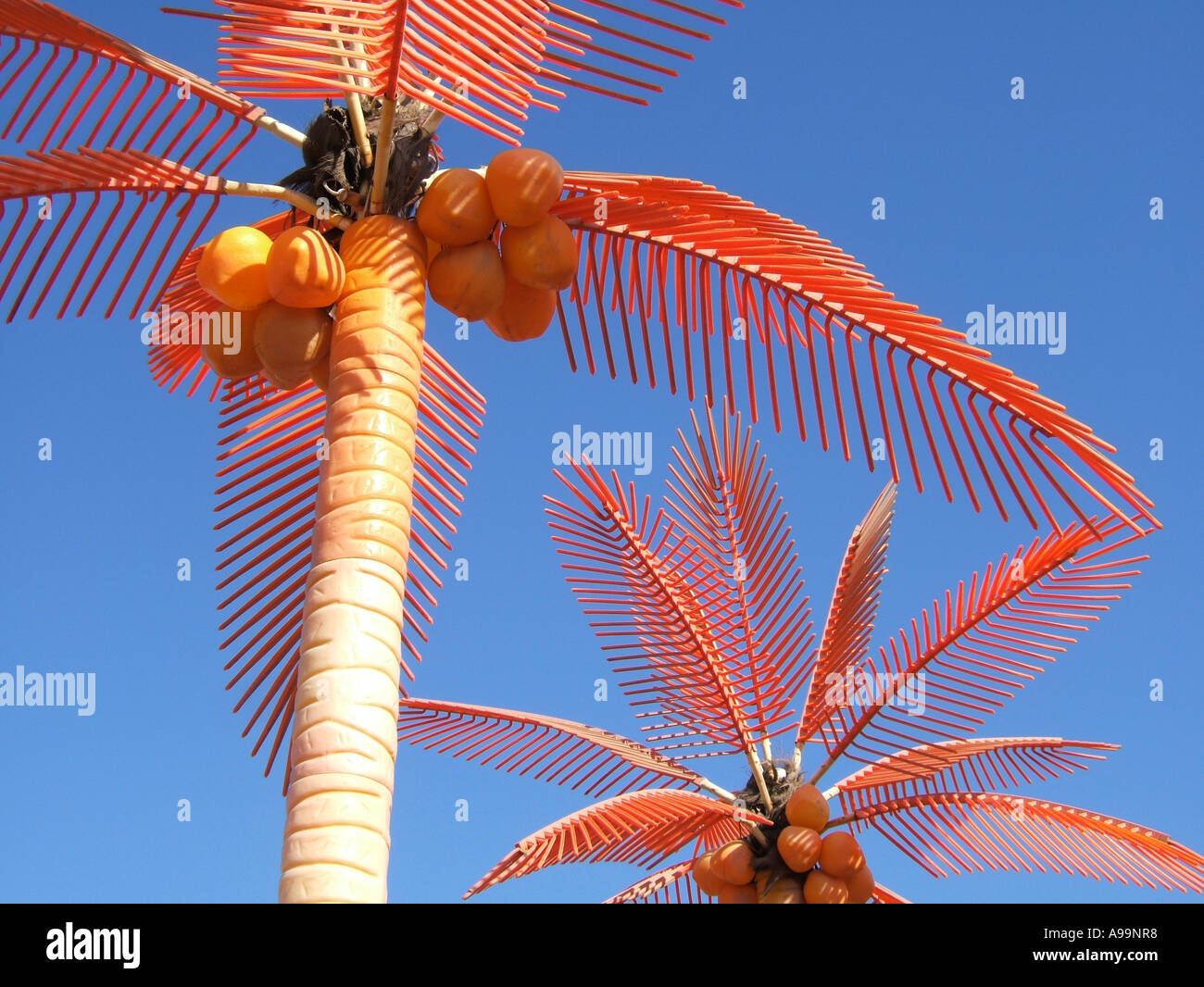 orange plastic palm trees Stock Photo - Alamy