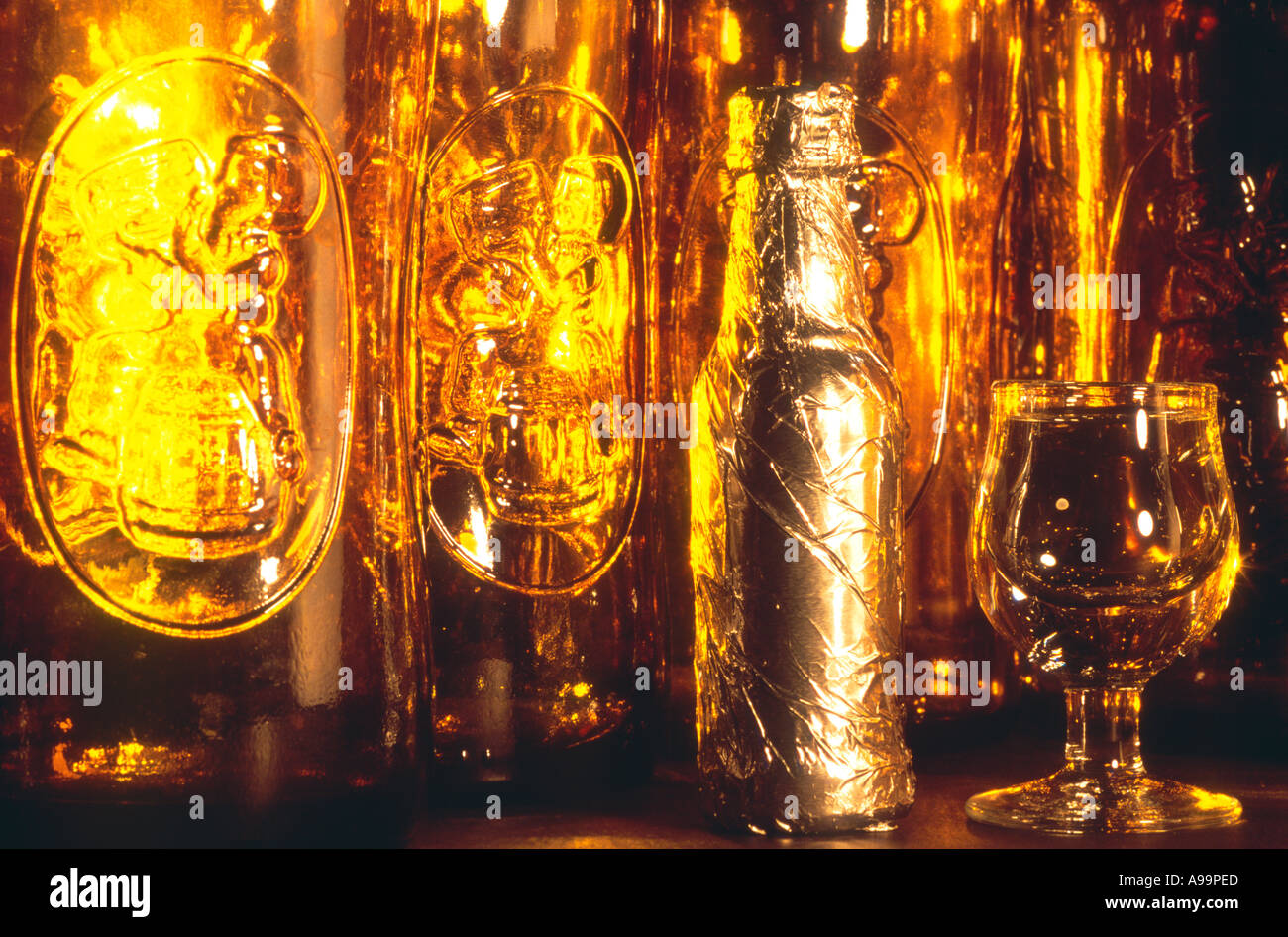 Glass and bottles of alcohol Stock Photo - Alamy