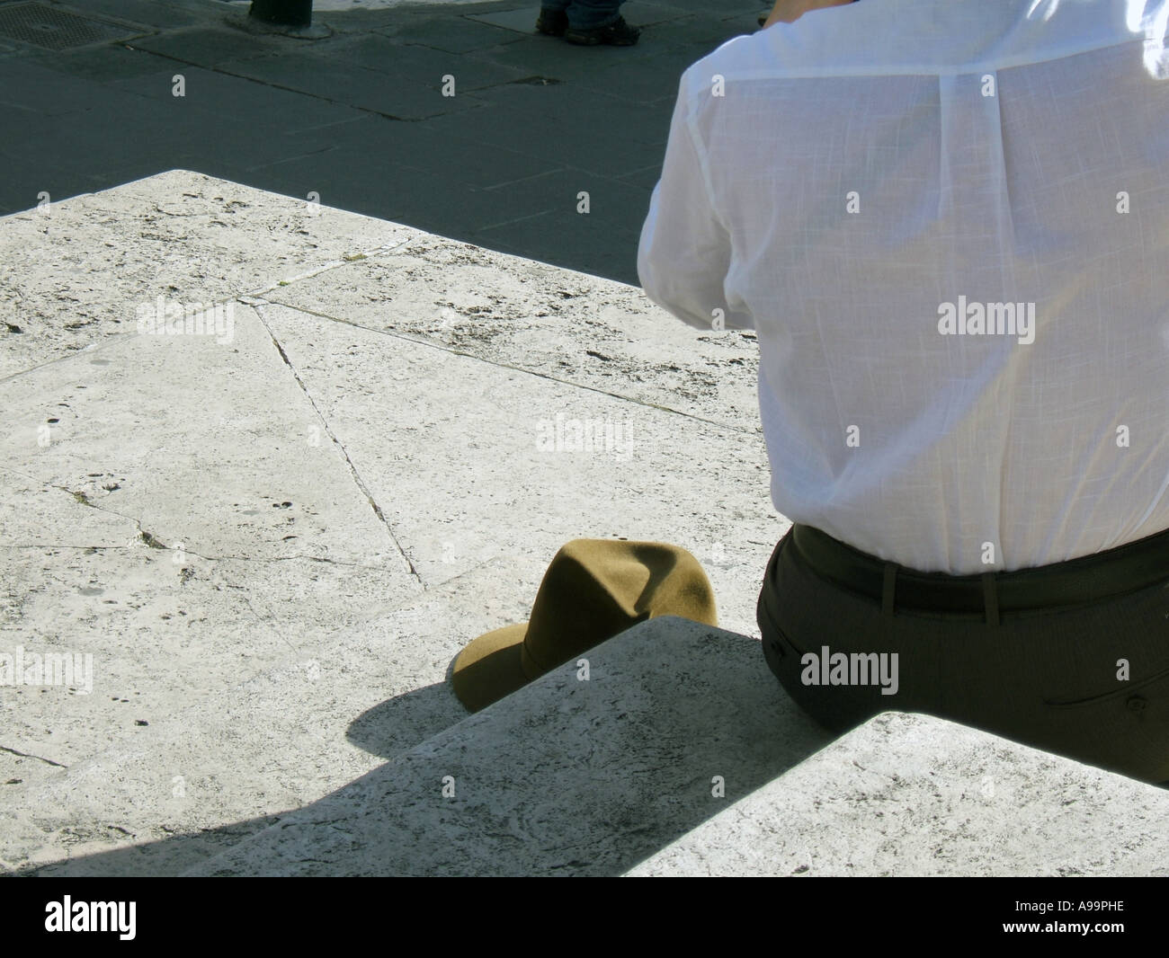 man sitting on steps Stock Photo - Alamy