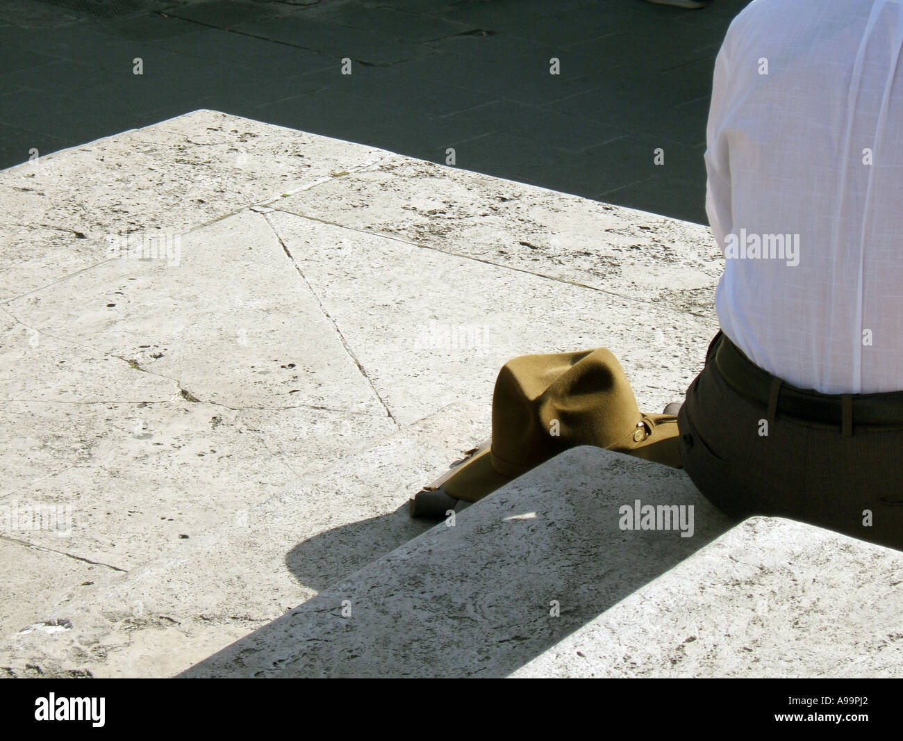 man sitting on steps Stock Photo - Alamy